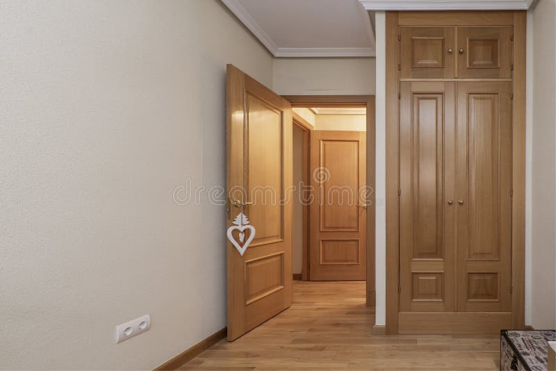 Built-in Wardrobe in the Bedroom with Oak Wood Doors, Floors of the ...