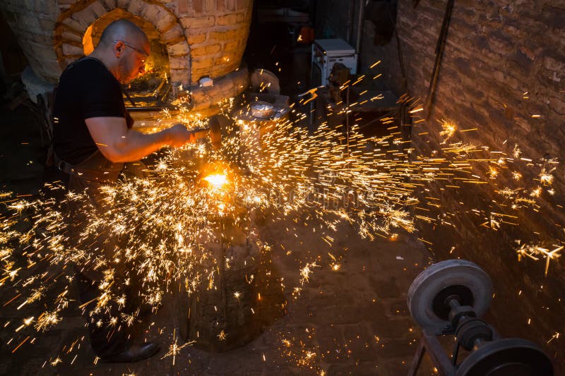 A Man Blacksmith Forging a Knife Blade Editorial Image - Image of ...