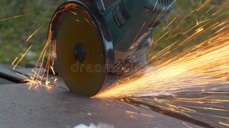 Angle Grinder at Work, Also Known As a Side Grinder or Disc Grinder ...