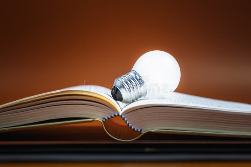 Bulb on Book stock photo. Image of literature, imagination - 83967146