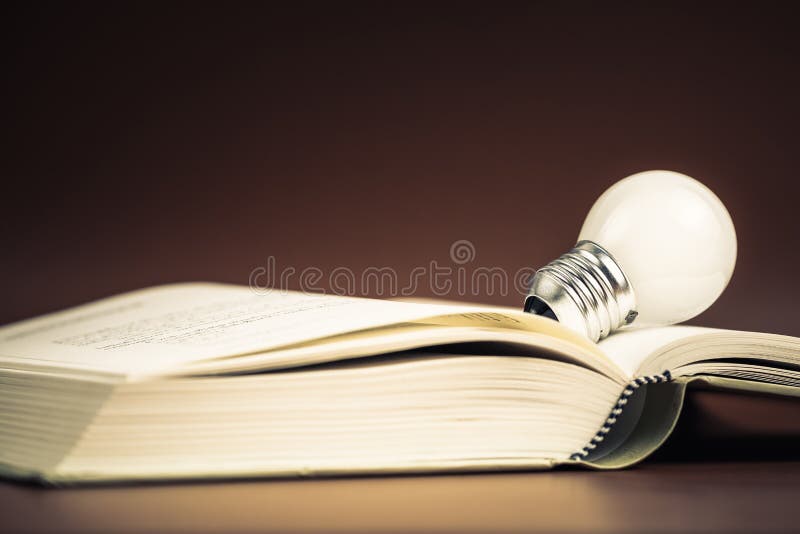 Bulb on Book stock photo. Image of literature, imagination - 83967146