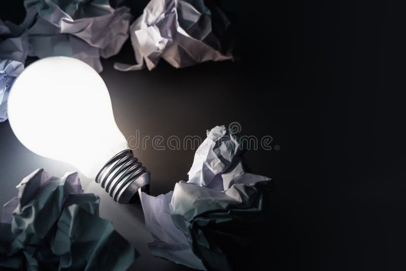 Bulb and Crumpled paper stock image. Image of knowledge - 63981115