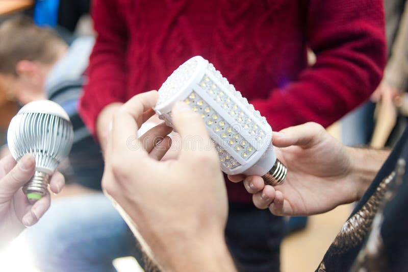 Bulb in hands stock image. Image of shine, saving, presentation - 27634453