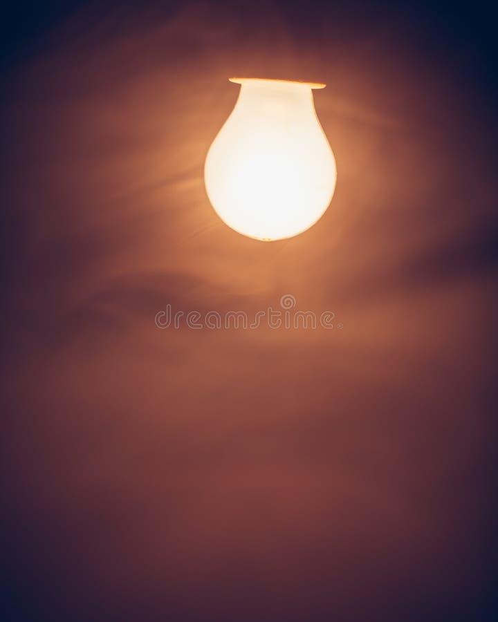 Bulb Lamp Warm Light in Fog Stock Photo - Image of copy, aesthetic ...