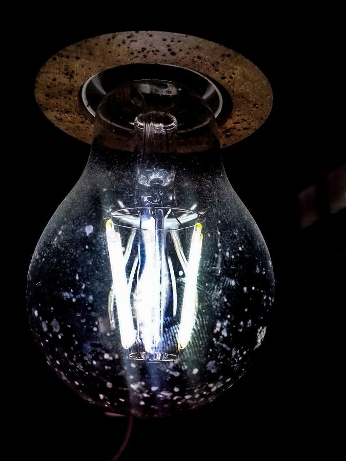Bulb Light Glow in the Darkness Night Stock Photo - Image of lighting ...