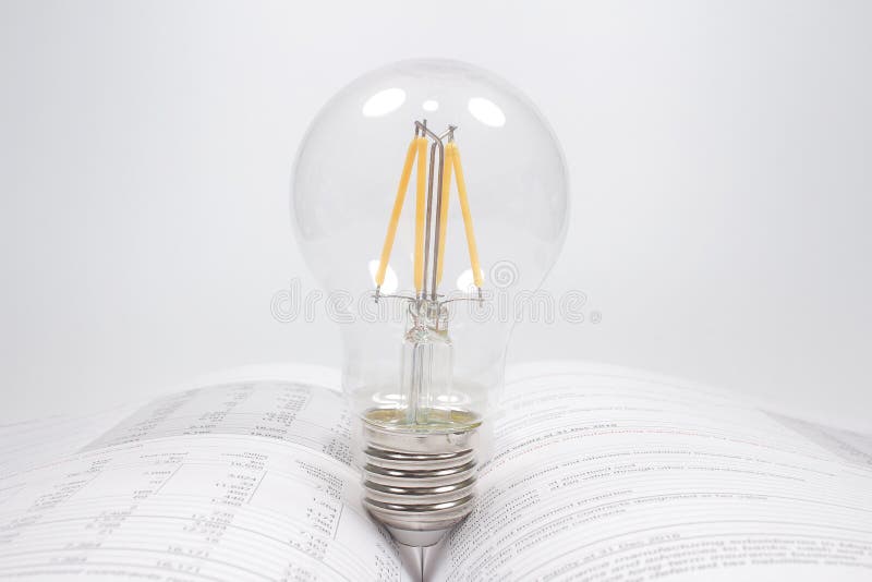 The Bulb on Open Book. Idea or Creativity Concep Stock Image - Image of ...