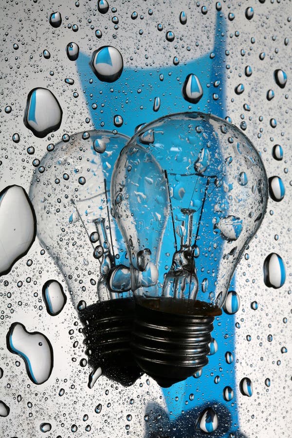 Light Bulb with Water and Splash Stock Photo - Image of glass, ecology ...