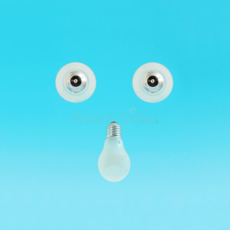 Bulbs in the Shape of a Face on a Blue Background. Minimal Creative ...