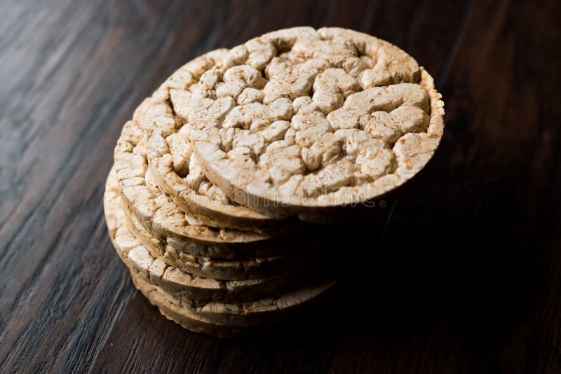 Bulgur Rice Cake Crackers Round Shaped on Dark Wooden Surface. Stock ...
