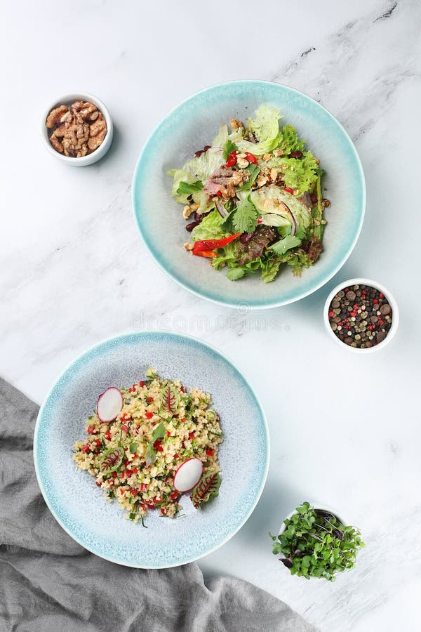 Bulgur with Vegetables and Salad with Fresh Vegetables and Meat on ...