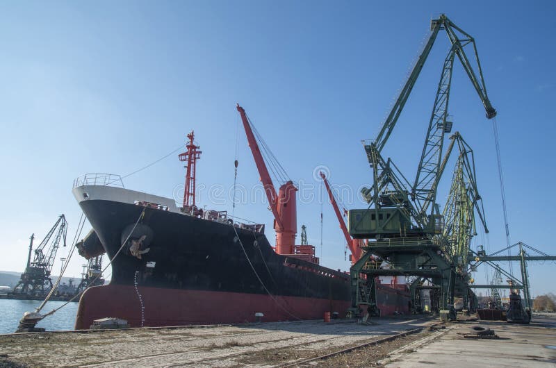 Bulk Cargo Ship with Cranes at Quay with Cranes Editorial Photography ...