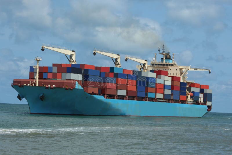 Bulk Cargo Ship Loaded with Container Sail Trough the Horizon in the ...