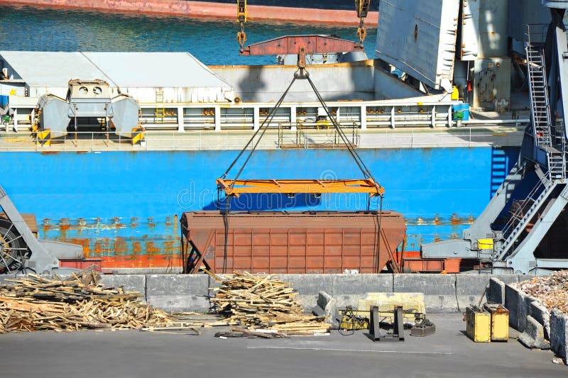 Bulk Cargo Ship and Train Under Port Crane Stock Photo - Image of ...