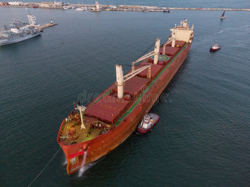 Bulk Carrier Cargo Ship Enters the Port for Unloading in the Evening ...