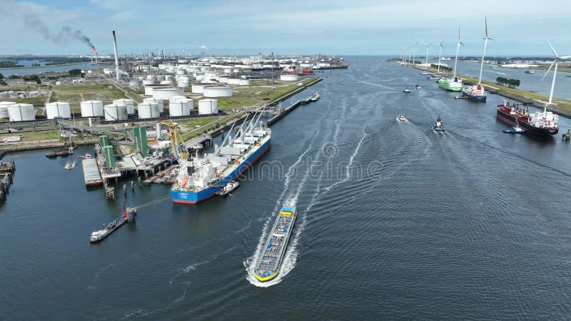 Bulk Carrier Ship at Port Offloading Cargo and Commodities by Shore ...