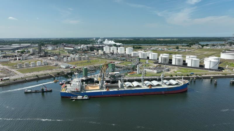 Bulk Carrier Ship at Port Offloading Cargo and Commodities Stock Video ...