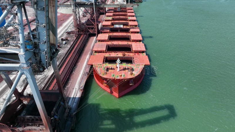 Cranes Unloading a Bulk Carrier Ship at Port Stock Footage - Video of ...