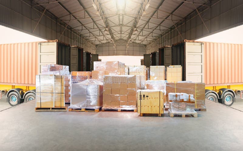 Bulk Pallets of Packaging Boxes Being Loaded Onto a Container Truck ...