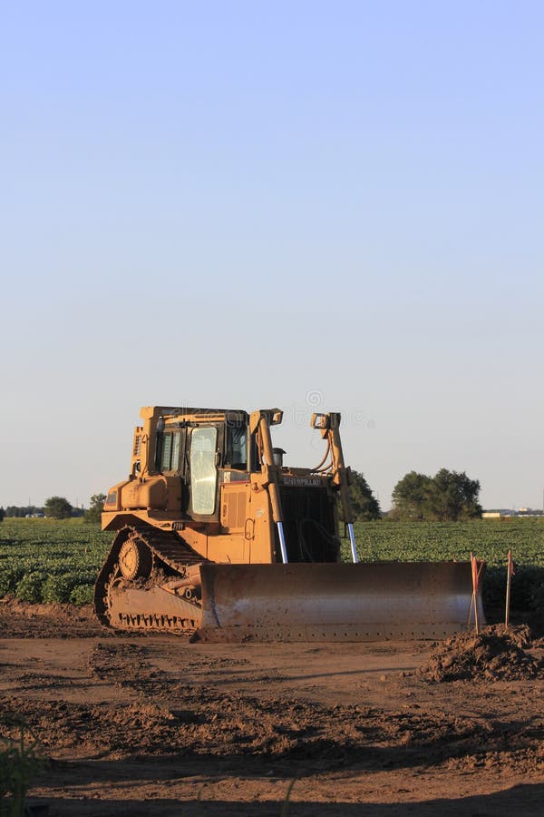 Bull Dozer in a Field at a Work Site Editorial Stock Image - Image of ...