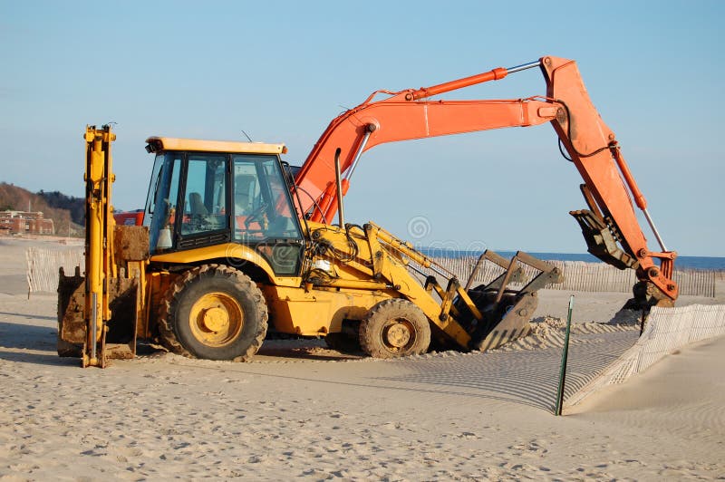 Bull dozers on sand stock image. Image of michigan, yellow - 9198891