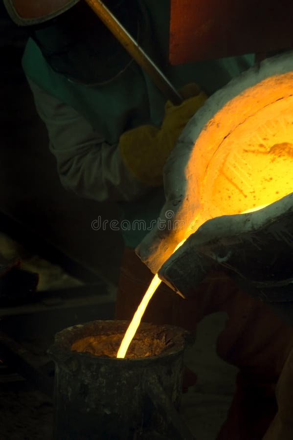 Bull Ladle to Ladle stock photo. Image of flames, intense - 764844