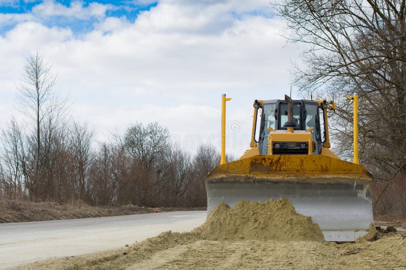 Bulldozed in road stock photo. Image of asphalt, machine - 269981708