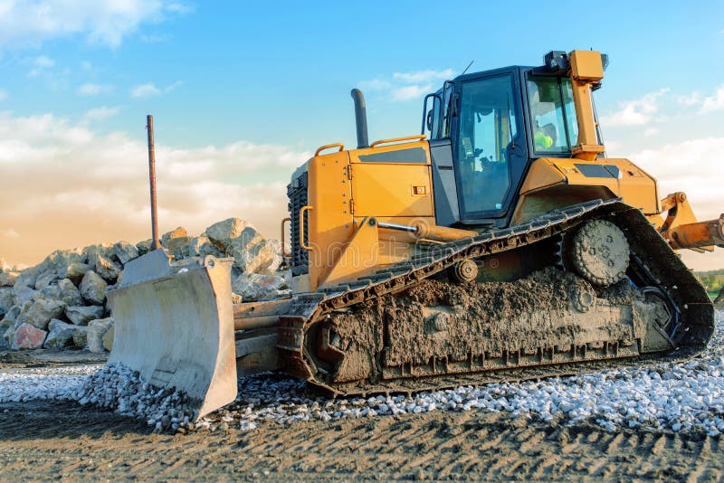 Bulldozer in Action on a Construction Site Close-up Stock Image - Image ...