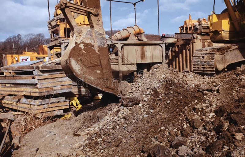 Bulldozer Bucket. a Bulldozer Digs a Hole Stock Photo - Image of ...