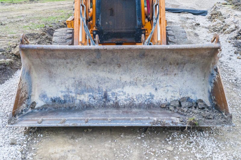 Bulldozer bucket stock photo. Image of dirt, building - 34626130