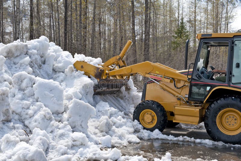 Bulldozer clearing snow stock photo. Image of moving - 11466834