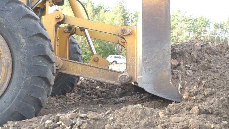 A Bulldozer Clears the Area for Road Construction. Stock Footage ...