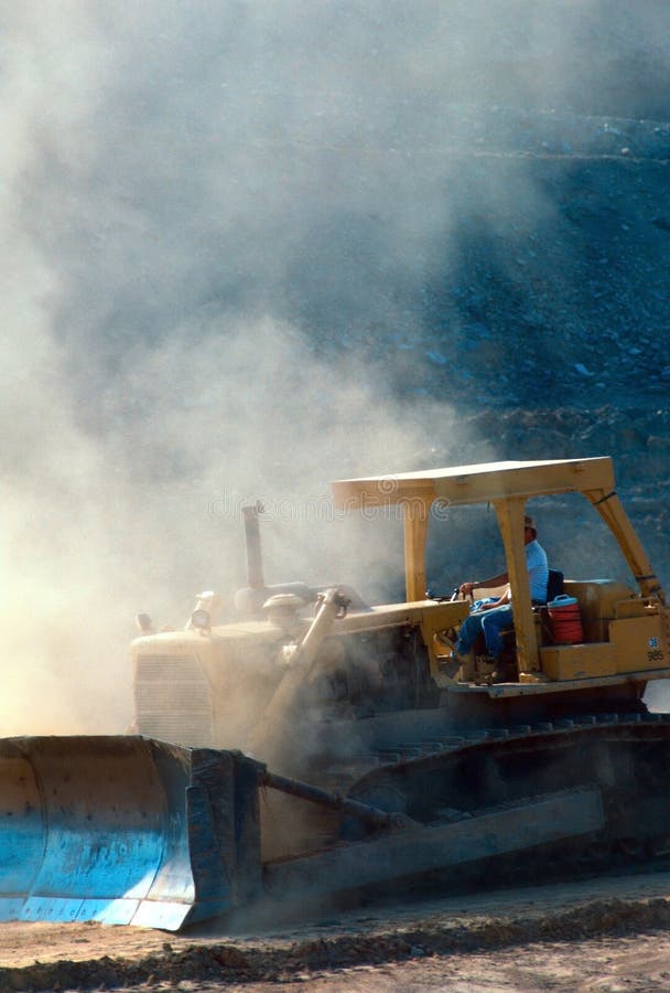 Bulldozer at a coal mine. stock image. Image of industry - 12096871