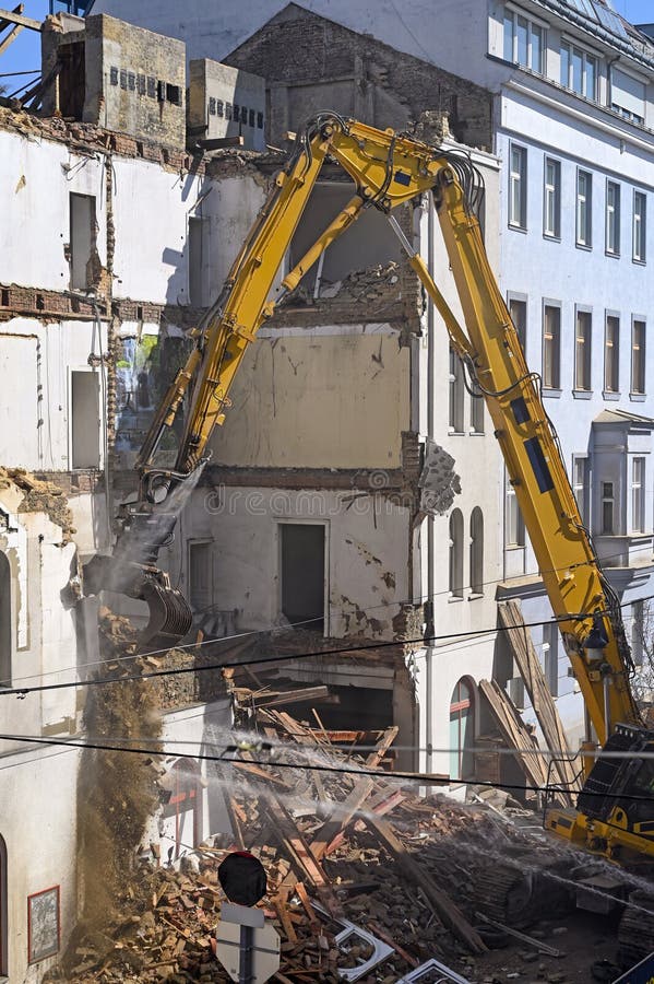 A Bulldozer is Demolishing an Old Building in Vienna Stock Image ...