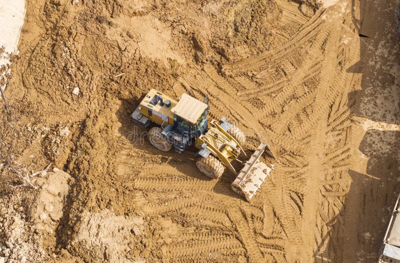 Bulldozer on Earthmoving at Construction Site, Aerial View Stock Photo ...