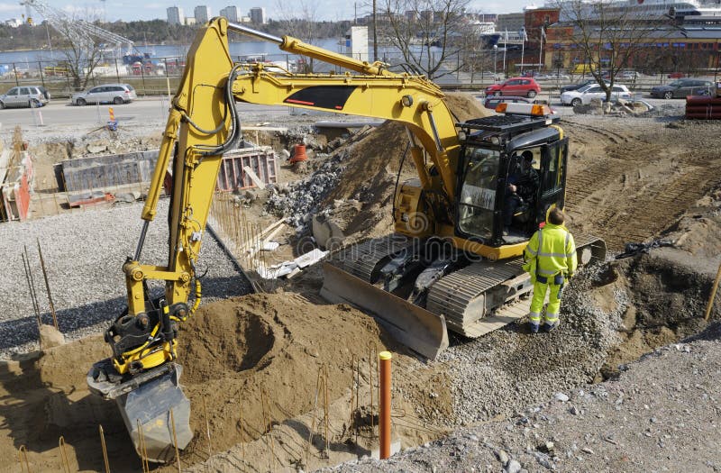 Bulldozer Inside Building Site Stock Image - Image of building, scoop ...