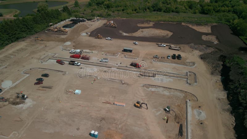 A Bulldozer Levels a Plot of Land for Construction Development. Top ...
