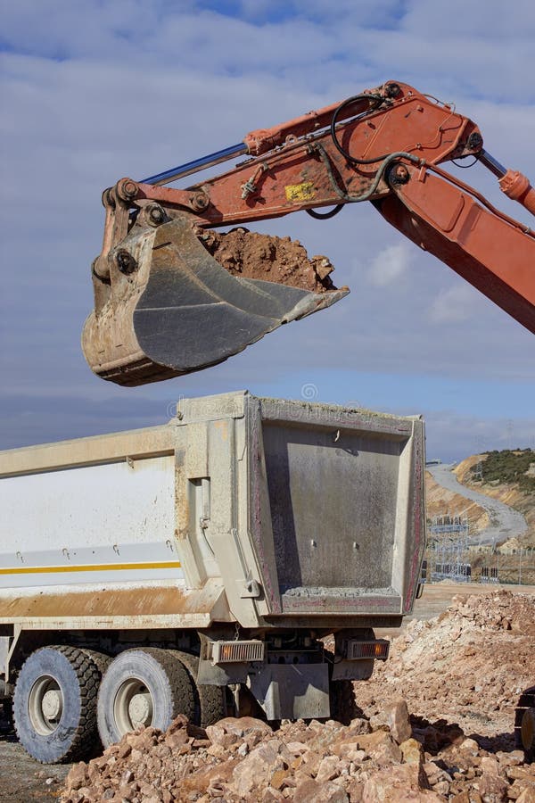 Bulldozer Loading Sand into the Truck Stock Photo - Image of working ...