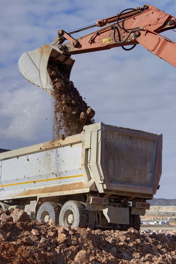 Bulldozer Loading Sand into the Truck Stock Image - Image of gravel ...