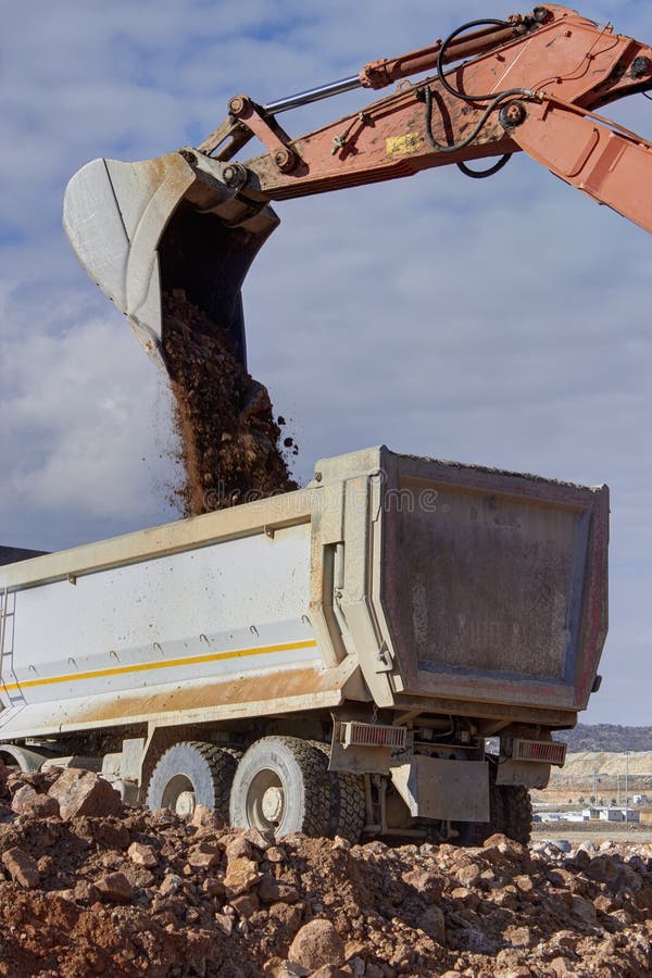 Bulldozer Loading Sand into the Truck Stock Image - Image of earth ...