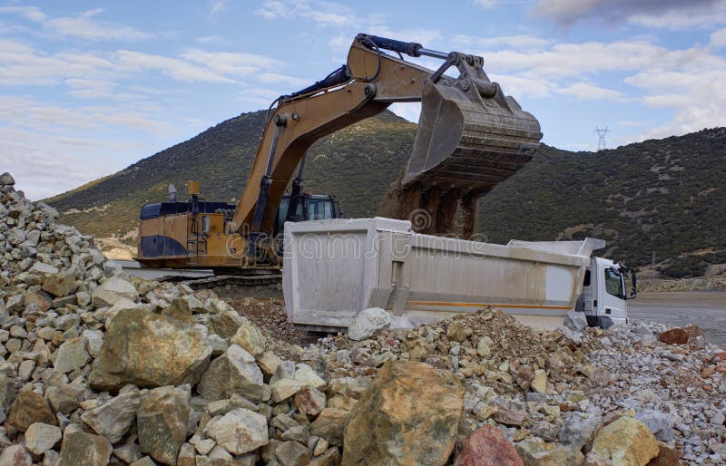 Bulldozer Loading Sand into the Truck Stock Image - Image of building ...