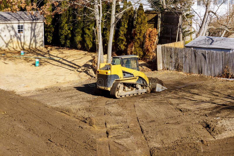 Bulldozer Moving, Leveling Ground at Construction Site Stock Image ...