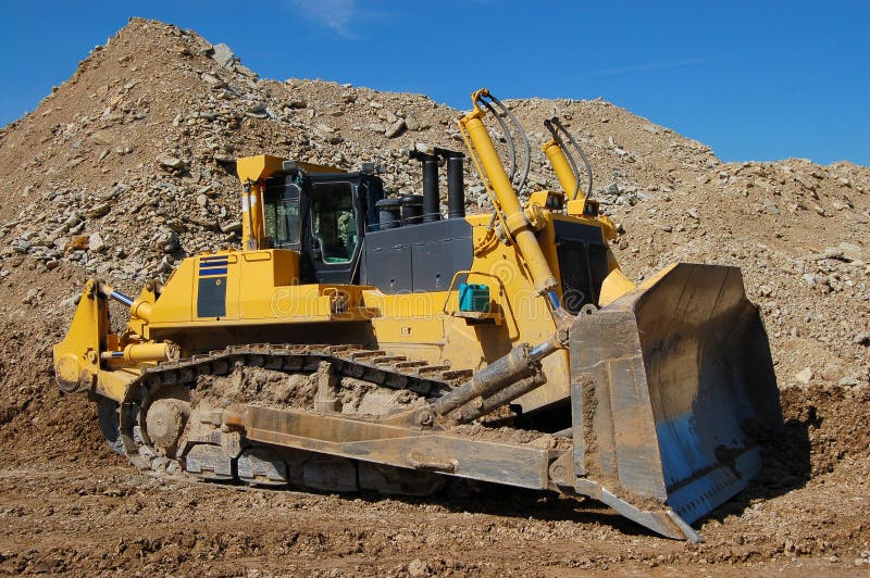 Bulldozer in open pit stock photo. Image of limestone - 12350198