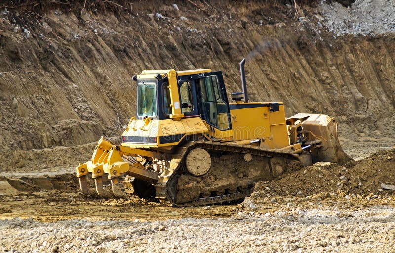 Bulldozer at the Road Construction Stock Image - Image of middle ...