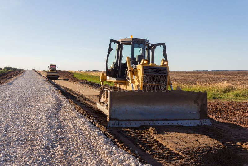 Bulldozer during Road Construction. Construction Machinery. Earth ...