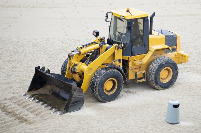Bulldozer in the sand stock photo. Image of machinery - 17458792