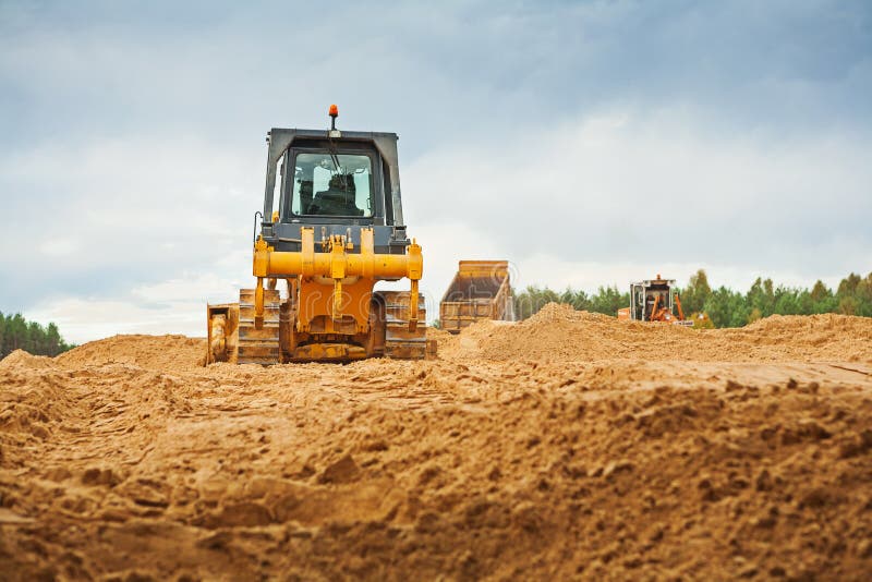 Bulldozer on sand stock photo. Image of engine, objects - 44311426