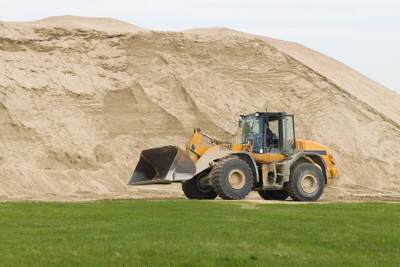 Bulldozer and sand editorial stock image. Image of activity - 42957379