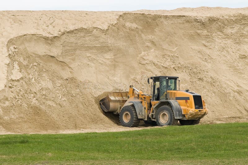 Bulldozer and sand editorial stock image. Image of construction - 42957394