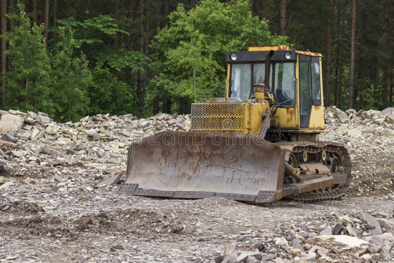 Bulldozer Standing in Forest for Deforestation. Stock Photo - Image of ...