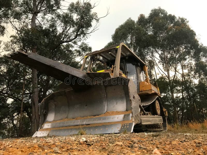 A Bulldozer with a Tree Pusher Attachment Stock Image - Image of ...